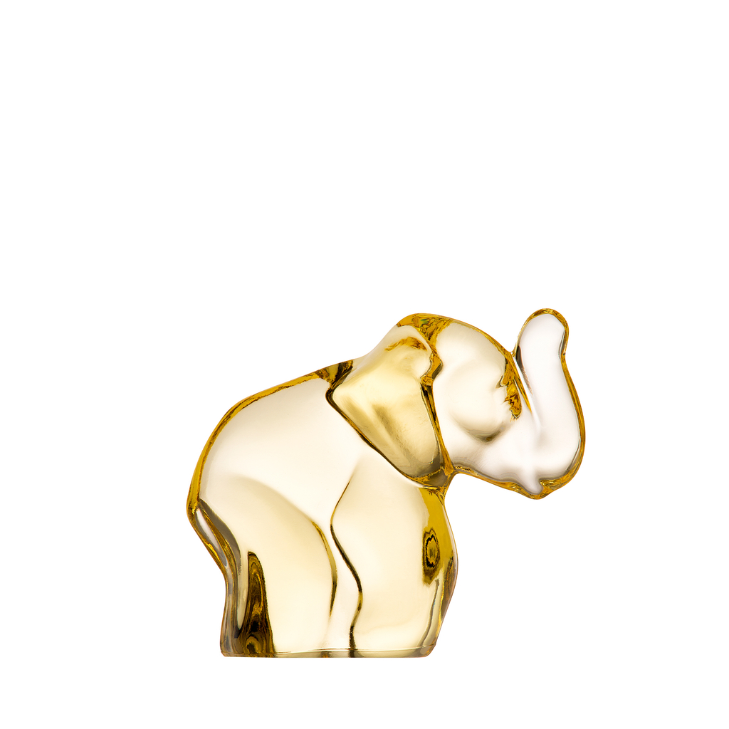 Yellow hand made crystal elephant figurine. By Moser Glassworks